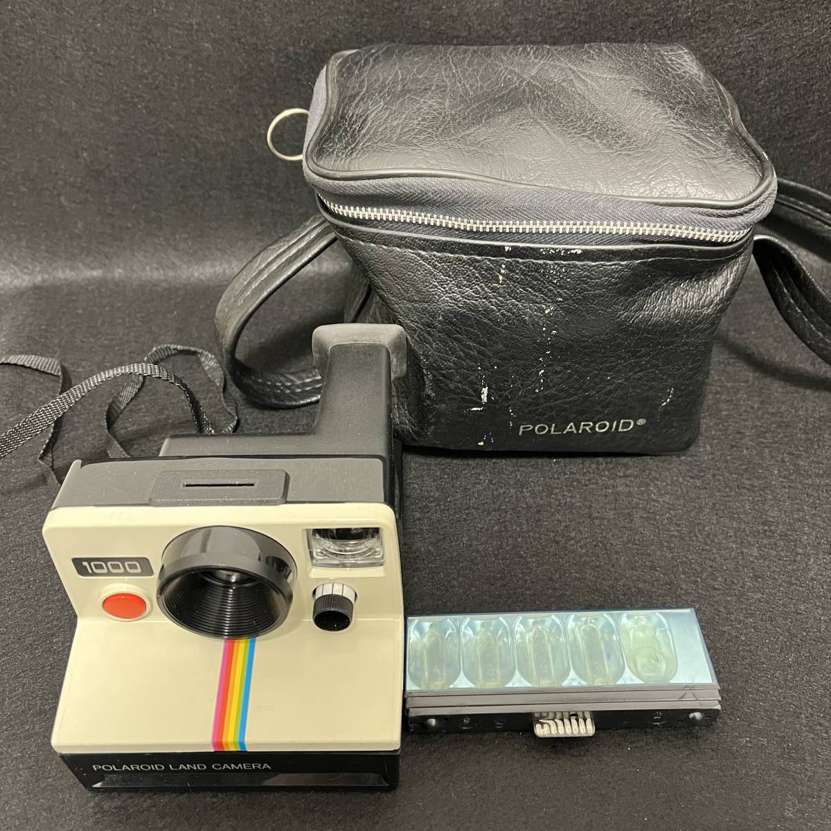 ケース フラッシュ付き Polaroid ポラロイドカメラ POLAROID LAND CAMERA 1000 インスタントカメラ 動作未確認 ...