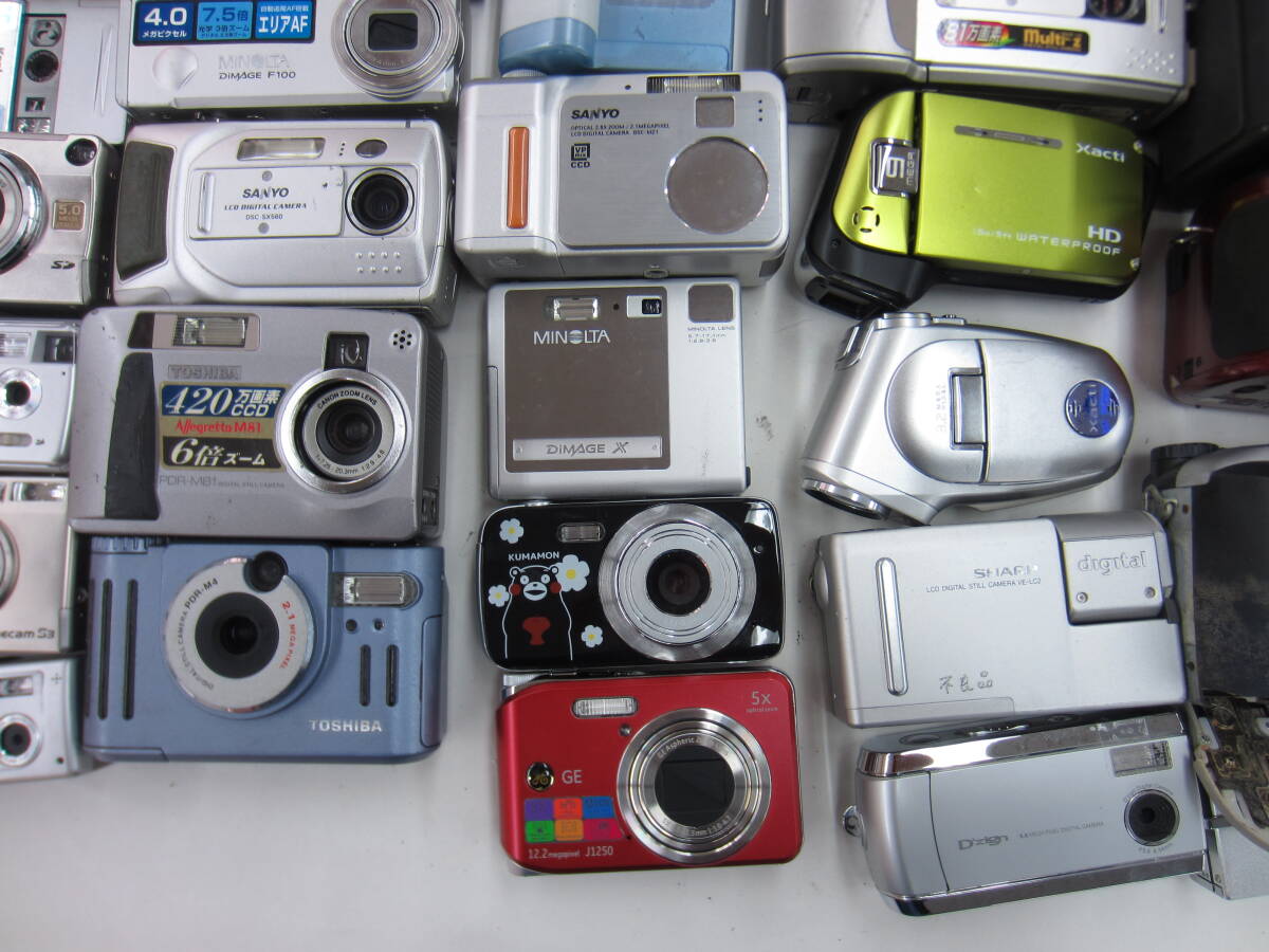 M5966K ジャンクKodak KONICA MINOLTA DiMAGE_Z5 F100 KYOCERA SANYO SHARP VE-LC2 TOSHIBA等まとめて大量セット55点 ...