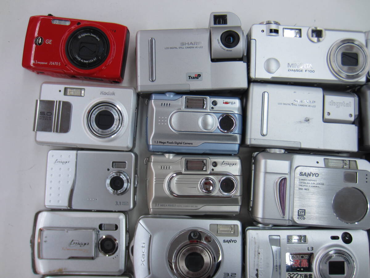 M5966K ジャンクKodak KONICA MINOLTA DiMAGE_Z5 F100 KYOCERA SANYO SHARP VE-LC2 TOSHIBA等まとめて大量セット55点 ...