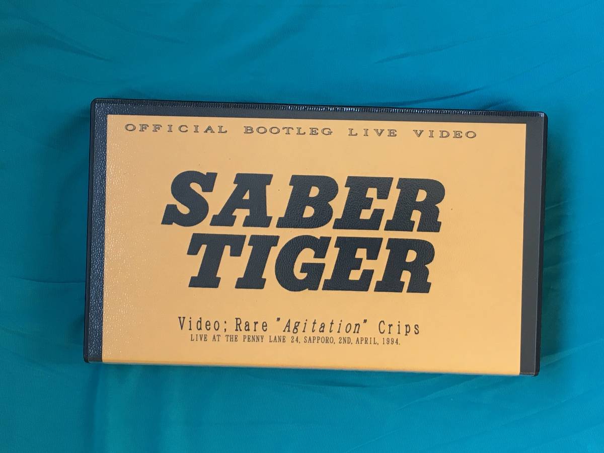 BD123q VHS ビデオ SABER TIGER サーベルタイガー OFFICIAL BOOTLEG LIVE VIDEO ...
