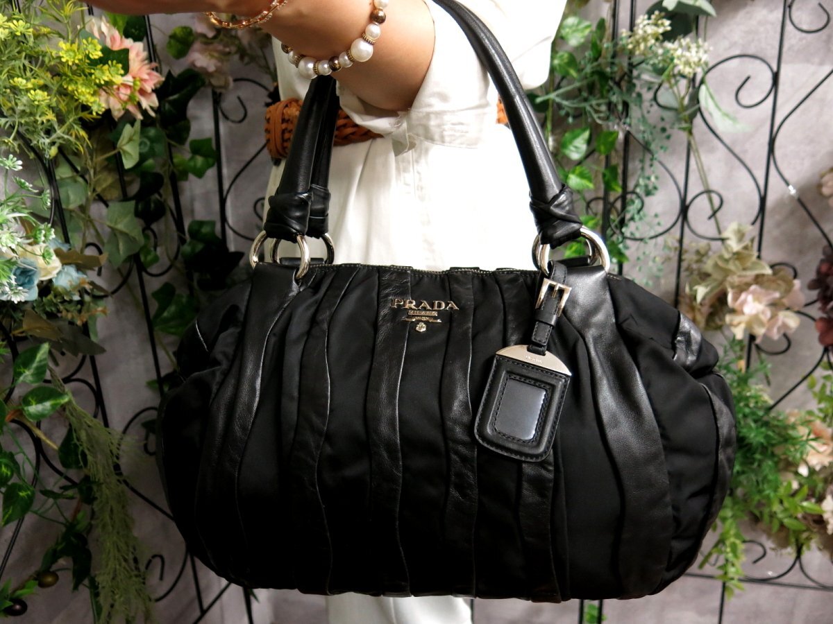 超 PRADA プラダ クリムゾン ロゴ金具 ポコノ ナイロン ラム レザー 本革 トート ハンド バッグ 黒 イタリア製 B5 Js56848(ハンドバッグ)｜売買されたオークション情報 ...