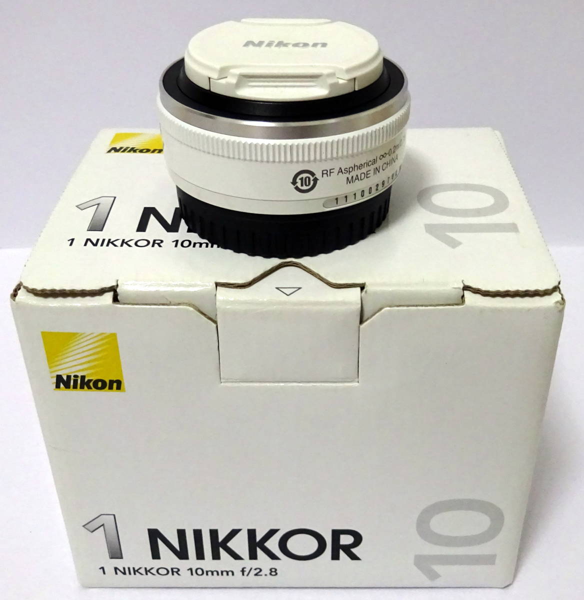 Nikon ニコン 単焦点レンズ 1 NIKKOR 10mm f/2.8 ホワイト フィルターのオマケつき(ニコン)｜売買されたオークション ...