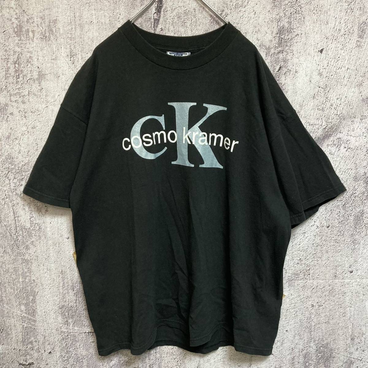 cosmo kramer CKロゴ プリント Tシャツ 半袖 カットソー USA製 サイズXL lee 古着 TV パロディ 海外 映画 ...