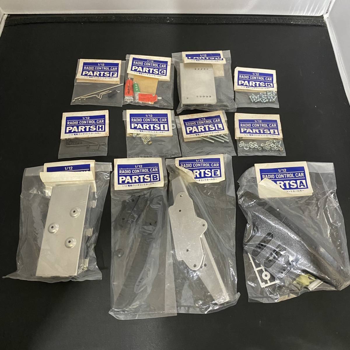 イマイ R/C 1/12 レース用 電動RC ポルシェ 935-78ツインターボ 未組立品 当時物 IMAI B-671 キット おまけ(組立 ...