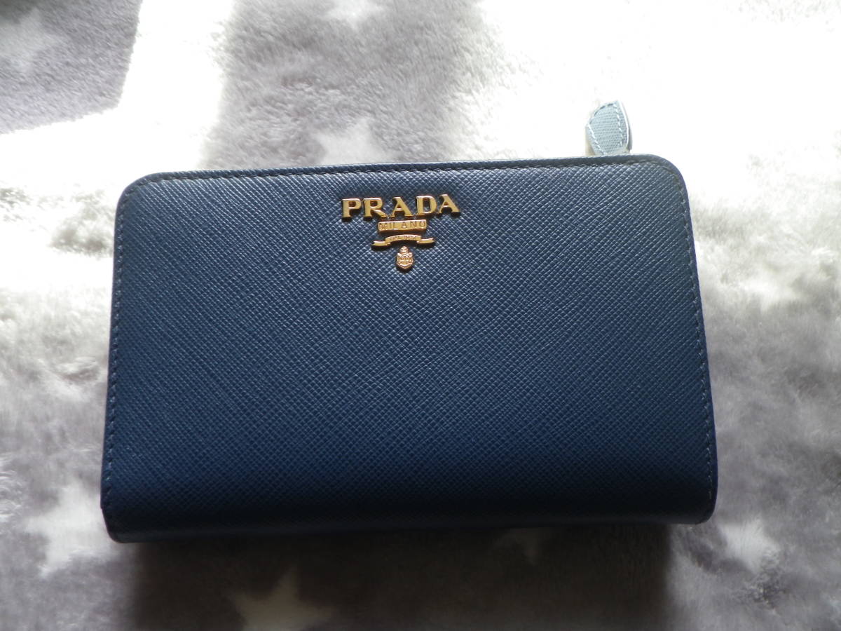 正規品 PRADA プラダ 二つ折り財布 財布 ネイビー サフィアーノ(女性用財布)｜売買されたオークション情報、yahooの商品情報をアーカイブ公開 - オークファン（aucfan.com）