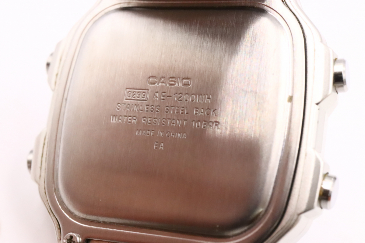 ト長 CASIO カシオ AE-1200WH 3299 WORLD TIME クオーツ QZ 腕時計 デジタル ワールドタイム シルバー× ...