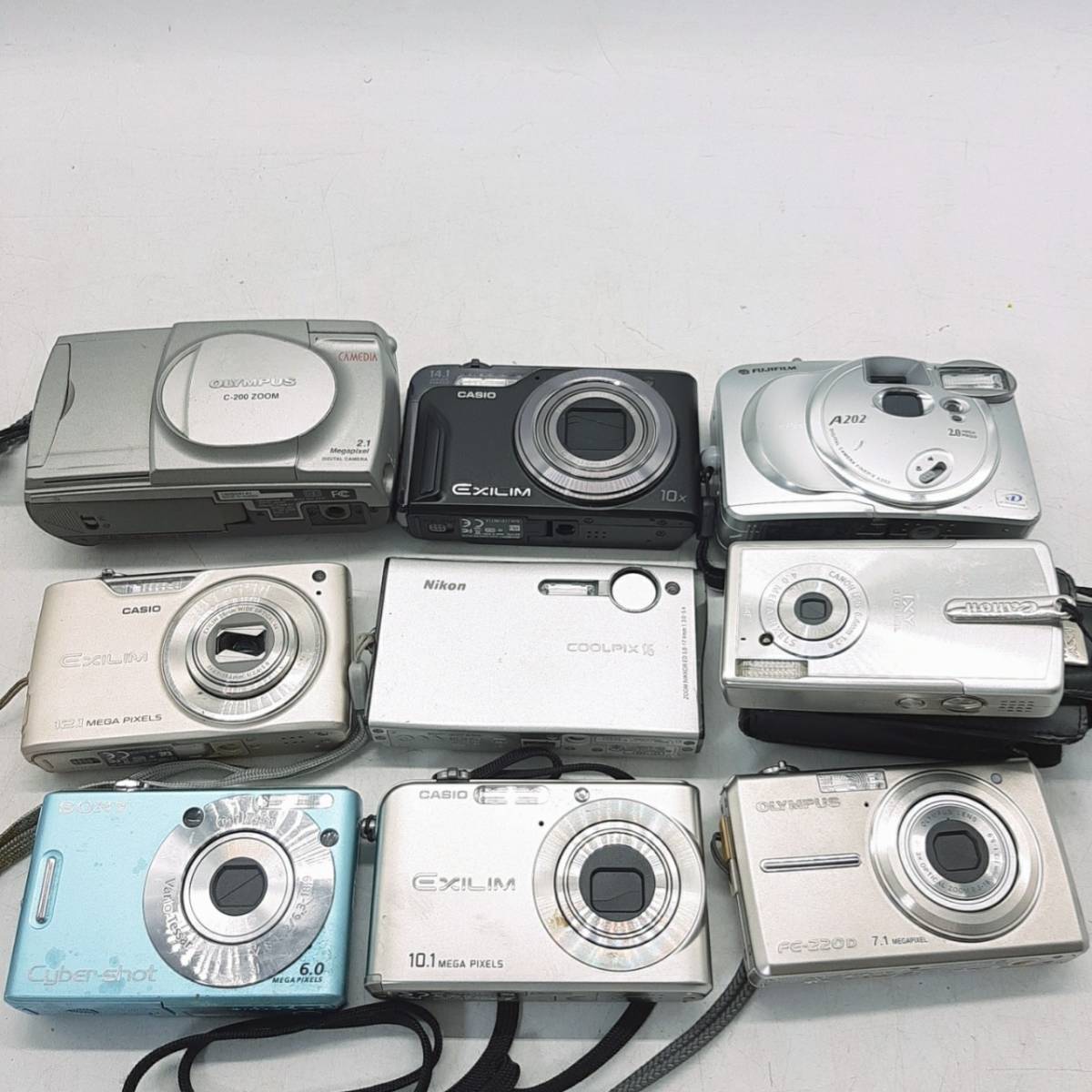 e29 1円スタート コンパクトデジタルカメラ まとめ 9点 コンデジ CASIO SONY OLYMPUS NIKON 動作未確認 現状品 ...