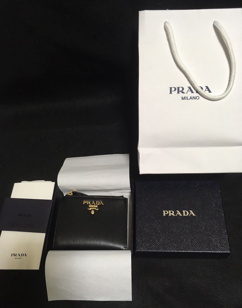 PRADA 二つ折り財布 プラダ ブラック 黒(女性用財布)｜売買されたオークション情報、yahooの商品情報をアーカイブ公開 - オークファン（aucfan.com）