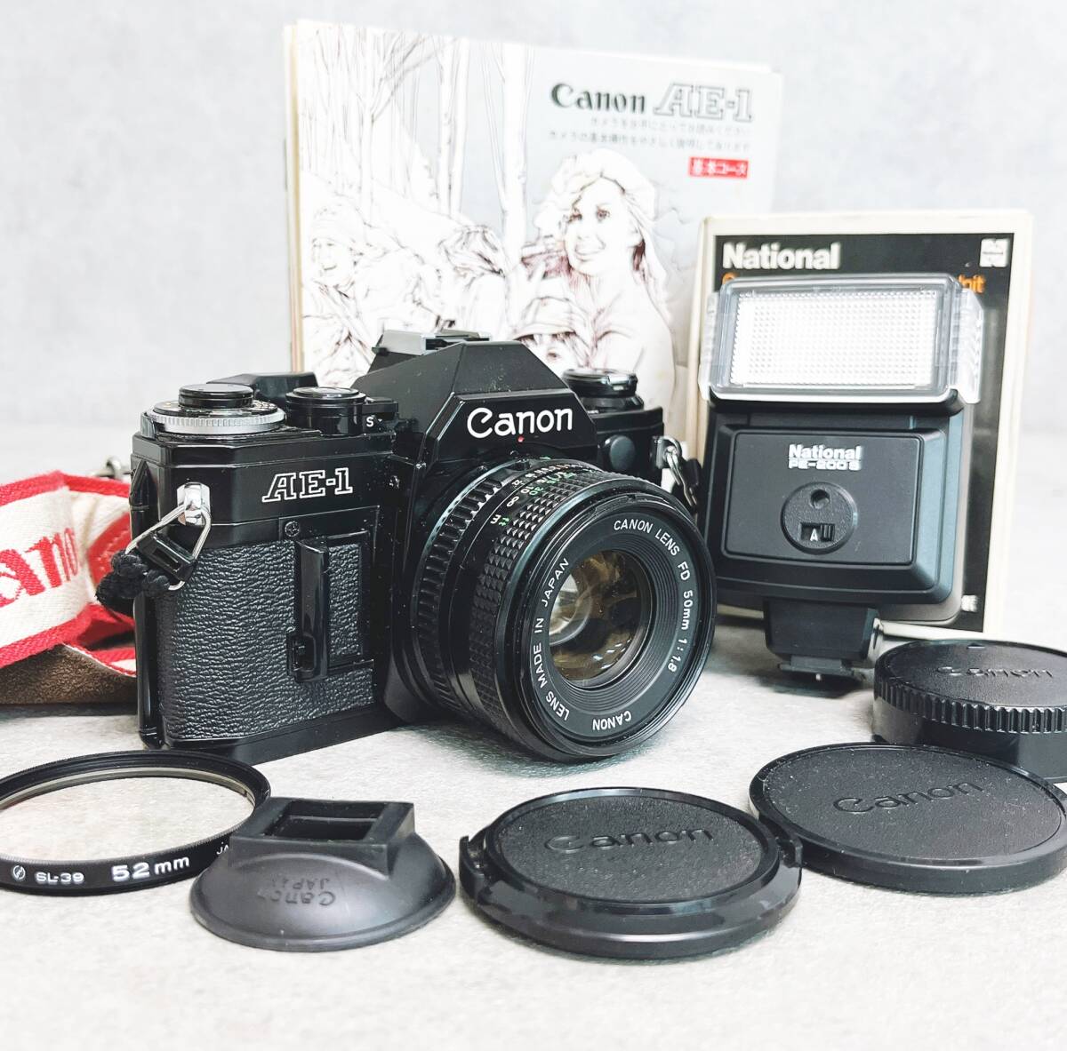 キャノン AE-1 フィルム一眼レフカメラ ブラックボディ フィルター ストロボ その他付属品付き CANON LENS FD 50㎜ 1：1.8(キヤノン)｜売買されたオークション情報 ...