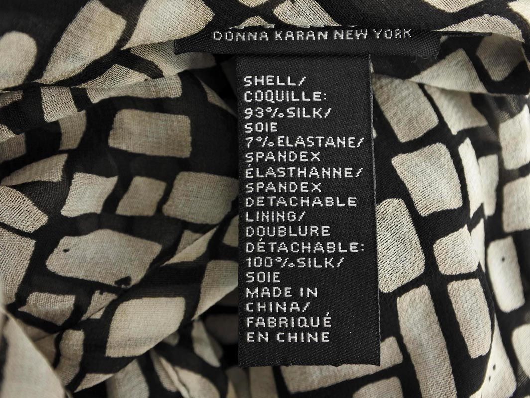 ネコポスOK DKNY ダナキャランニューヨーク シルク混 総柄 ブラウス シャツ size2/黒xオフホワイト bgb2(半袖シャツ)｜売買されたオークション情報、yahooの商品情報を ...
