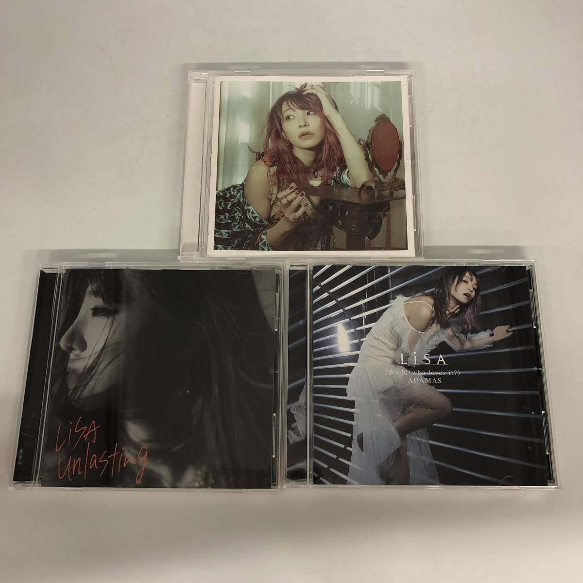 LiSA CD 3枚セット 紅蓮華 unlasting 赤い罠 who loves it /ADAMAS ⑤(アニメソング一般)｜売買された ...