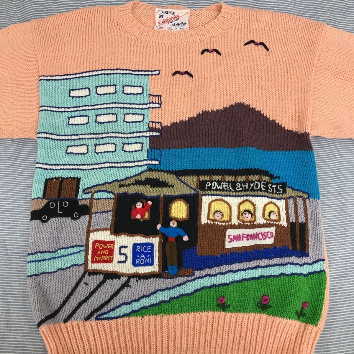 Y413 California sweaters ペルー製 ニット セーター トップス ハンドメイド 男女兼用 サーモンピンク 刺繍 古着(M ...