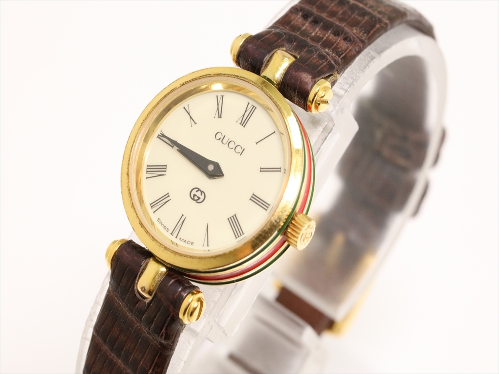 正規 GUCCI/グッチ スイス製 GGロゴ有 アイボリーローマン シェリーラインカラー リザードベルト QZ レディース腕時計 F347 ...