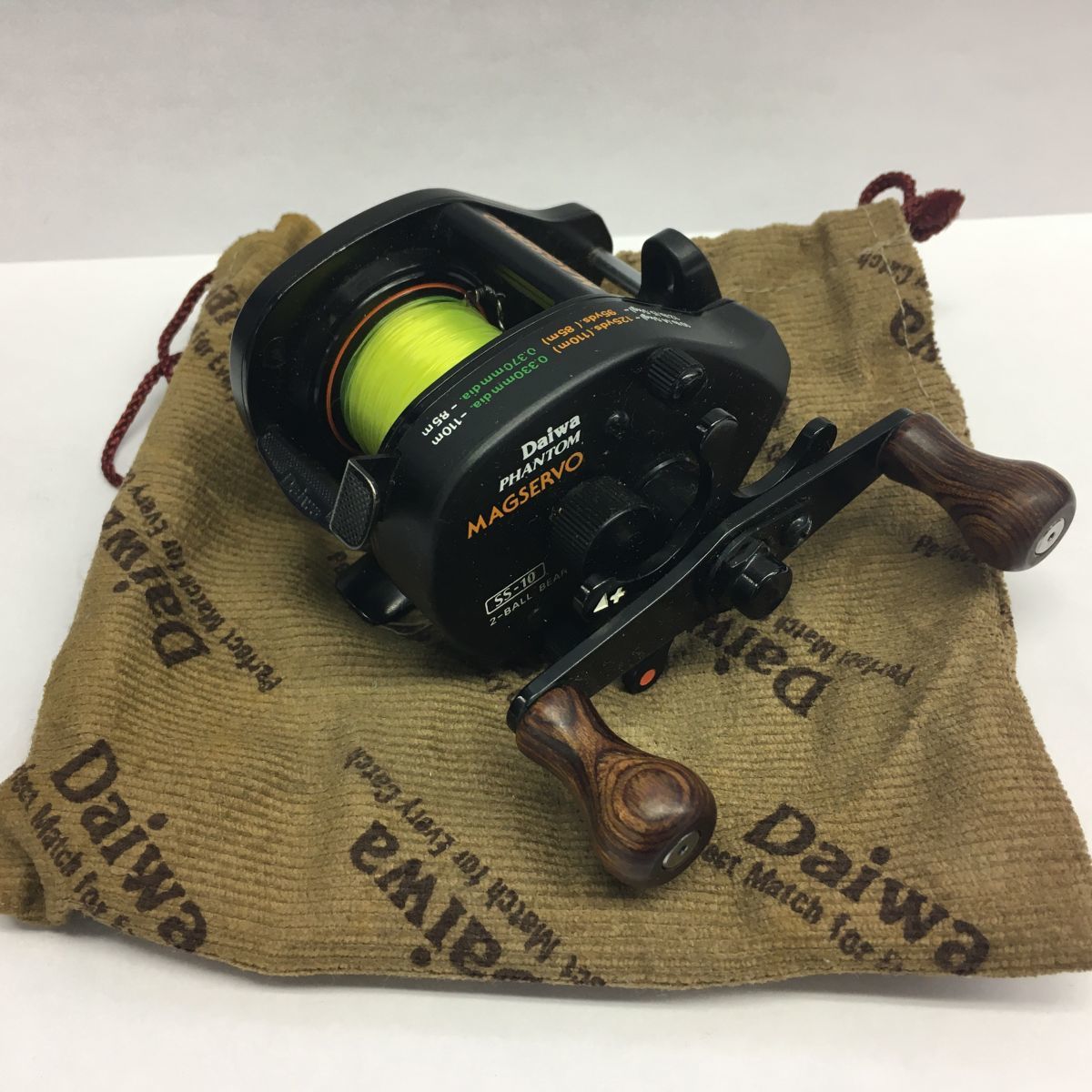 M223-I26-2804 Daiwa ダイワ PHANTOM MAGSERVO SS-10 ベイトリール 巾着付き ⑯(ダイワ)｜売買された ...