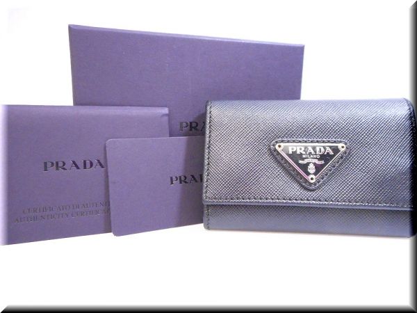 1円~ PRADA プラダ SAFFIANO サフィアーノ M222A 6連キーケース NERO ブラック ジャンク(服飾小物)｜売買された ...