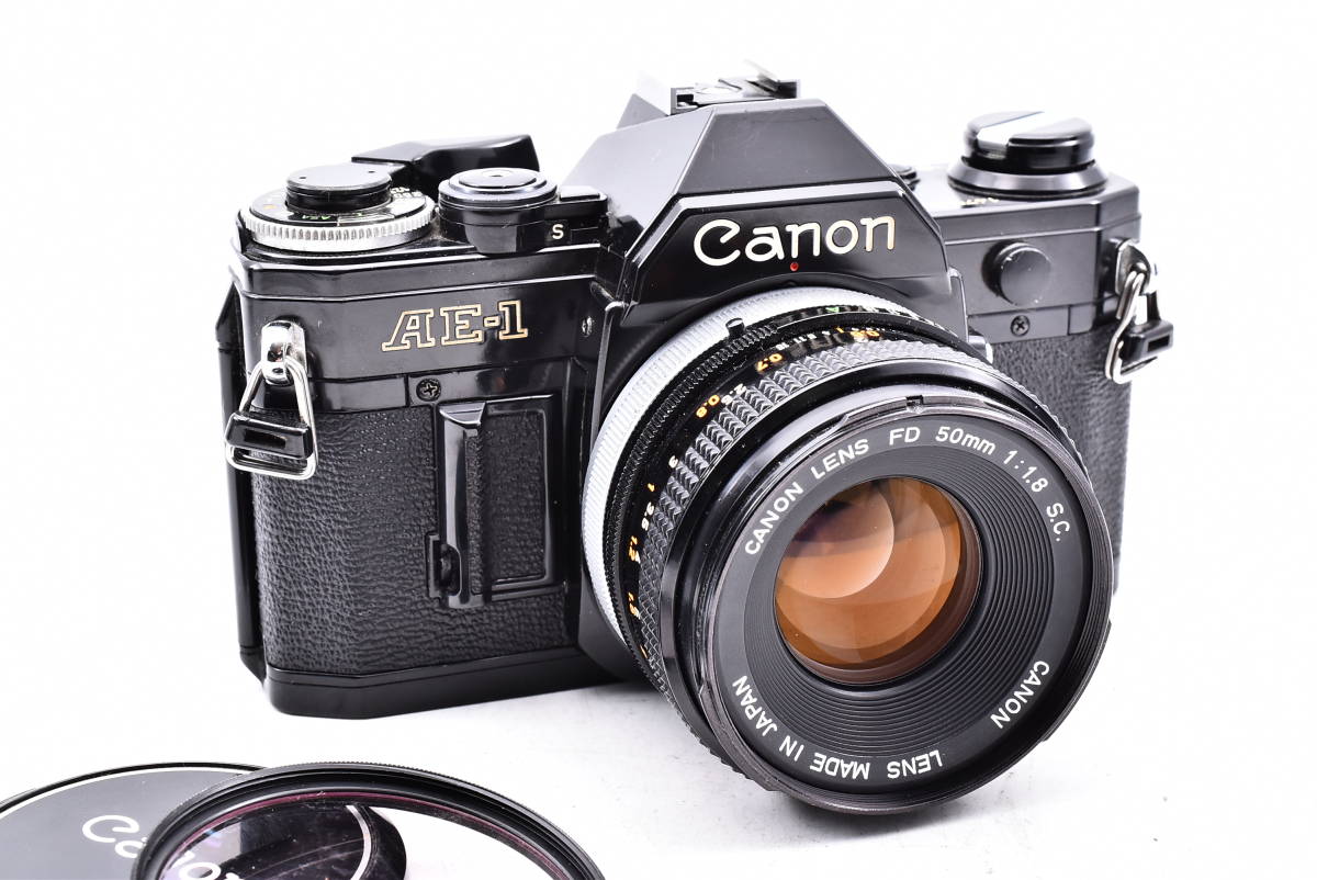 C4-0060 Canon キヤノン AE-1 一眼レフ ブラック ボディ FD 50mm f/1.8 S.C. レンズ フィルター 付き ...